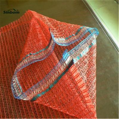 Cina Sacchetto di rete Raschel con sigillo a corda di trazione per l'imballaggio di cipolle riciclabili in HDPE in giallo in vendita