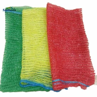 Cina Sacchetto di rete Raschel con sigillo a corda di trazione per l'imballaggio di cipolle riciclabili in HDPE in giallo in vendita