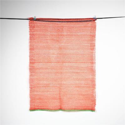 Cina 41*59cm campione gratuito Orange Color Raschel Mesh Bag per sacchi di cipolle e patate in vendita