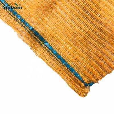 Cina 41*59cm campione gratuito Orange Color Raschel Mesh Bag per sacchi di cipolle e patate in vendita