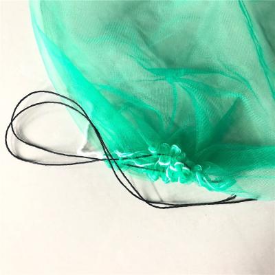 Cina Agricoltura sicura e durevole HDPE monofilamento sacchetto a maglia di dattero per copertura di palma di dattero in vendita