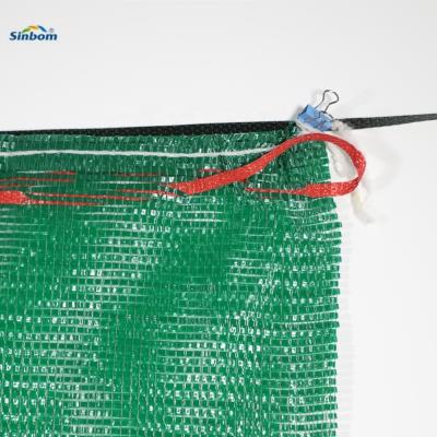 Cina Sacchetto di maglia di lino giallo per imballaggi a maglia in PP cipolle frutta verdura e legna da ardere in vendita