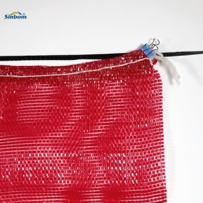 Cina Sacchetto di maglia di lino giallo per imballaggi a maglia in PP cipolle frutta verdura e legna da ardere in vendita