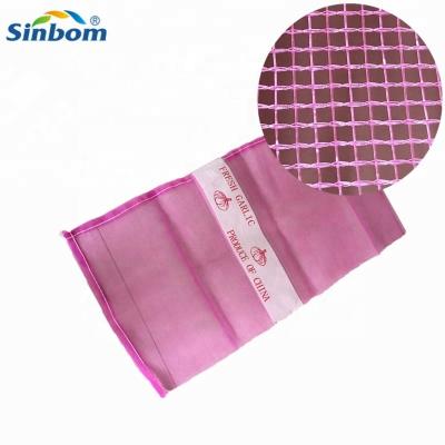 Cina Confezionamento di aglio fresco Pp Frutta Sacchetto a corda a maglia rosa Realizzato in materiale 100% PP/PE in vendita