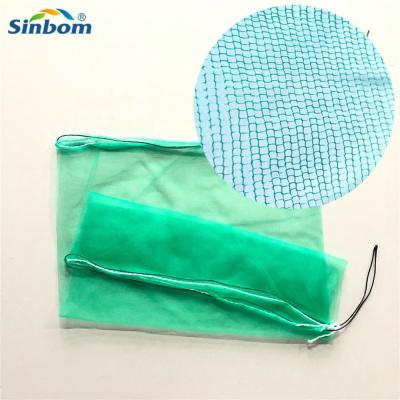 中国 52g ホワイトまたはカスタマイズされた 100% バージンPE グリーン デートパーム メッシュ バッグ 80X100MM 70X90MM 販売のため