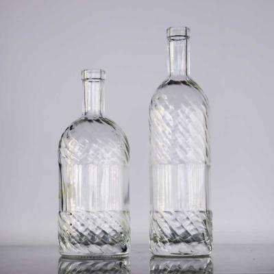 China 750ml de Fles van de bourbonwhisky/rond In reliëf gemaakte fles/Gekurkte Geestflessen/Buitensporige Glasalcoholische drank Te koop