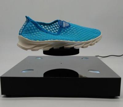 China magnetic floating bottom levitation  shoes cellphone watch display rack heavy 0-500g for sale