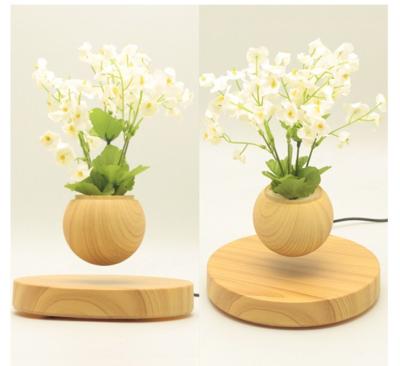 China Wooden round base magnetic levitation floating bottom air bonsai plant flowerpot gift ornamenet for sale