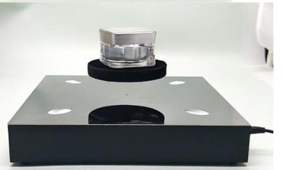 China magnetic levitation bottom 500G SHOES cellphone display stand with 4 led light for sale