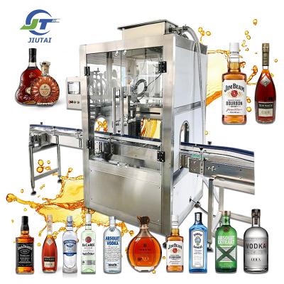 China Automatic Liquid Filling Machine with High-Precision Servo Tracking Rail Negative Pressure Filling Valve and Automatic Height Adjustment for sale