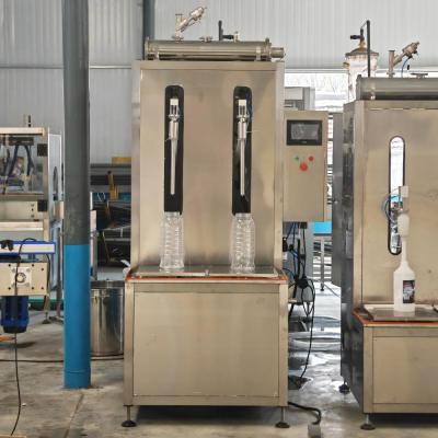 China Semi Automatic 2 Heads Lobe Pump Weighing Filling Scale 20L Plastic Bottle Packing Intelligent Liquid Bottling Filling Machine for sale