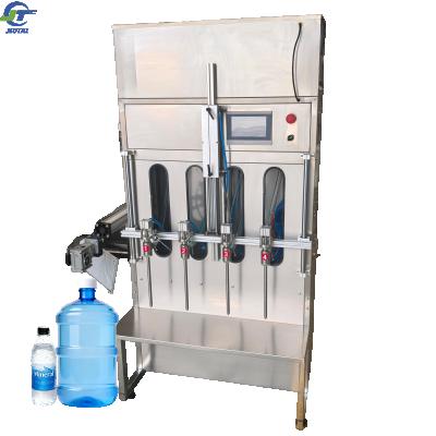 China Semi Automatic Gravity Flow Filling Machine for Beverage Water Barrel Filling for Small Business for sale