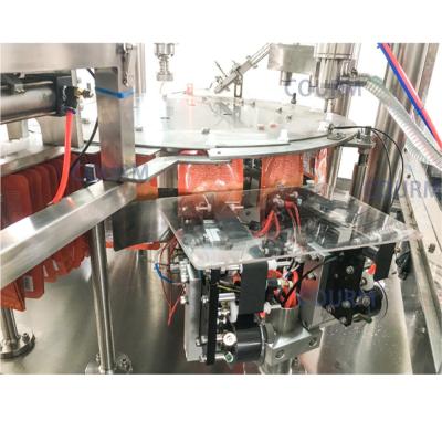 China COURM Automatic jelly ketchup cream liquid plastic suction bag vertical bag soymilk filling capping packaging machine for sale
