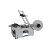 China COURM Semi automatic Hand Press Round Bottle Label Production Date Coding Plane Drop Round Bottle Labeling Machine for sale