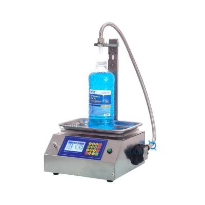 China Small automatic honey mineral water disinfection water liquor edible oil glue viscous liquid liquid weighing filling machine for sale