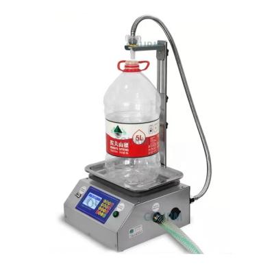 China Automatic household viscous milk honey peanut sesame oil liquid edible oil quantitative metering stainless steel filling machine for sale