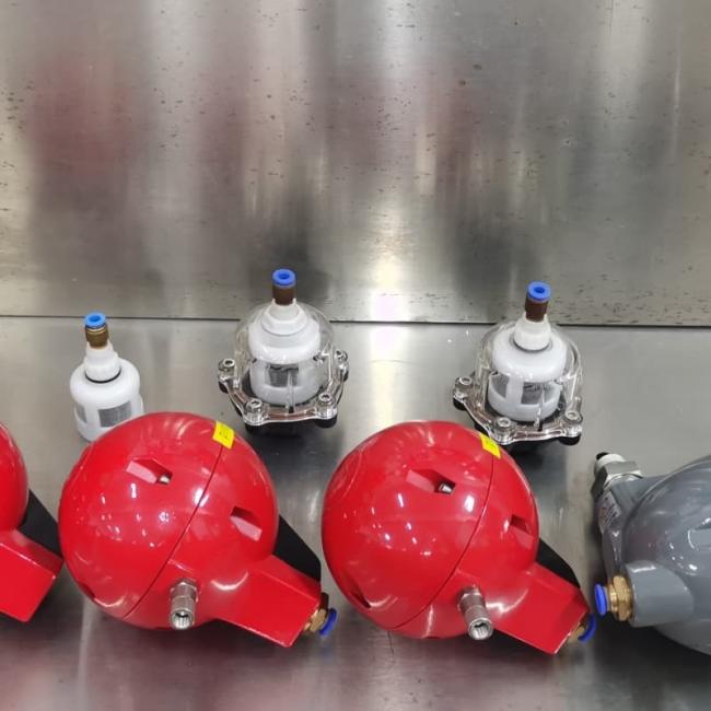 Internal Auto Drain component showing aluminum construction