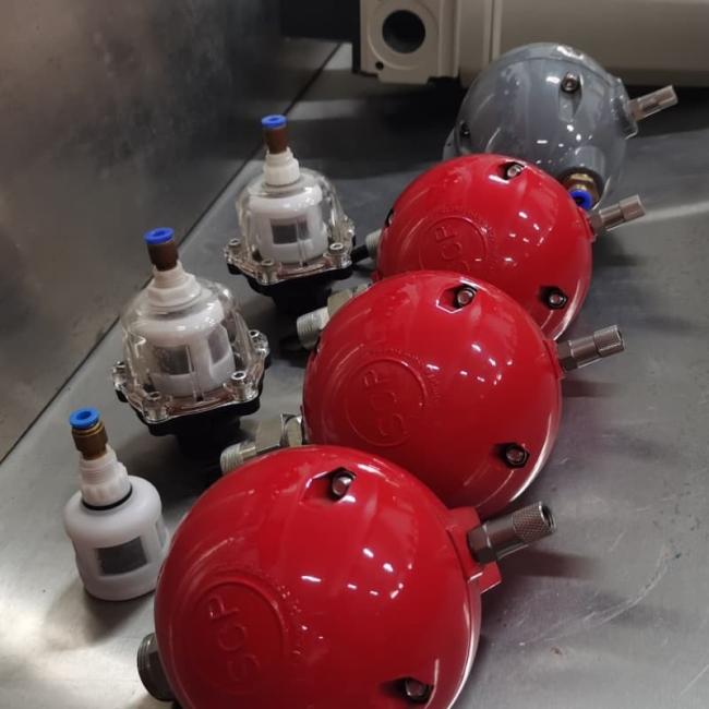 Close-up view of Internal Auto Drain ports and connections