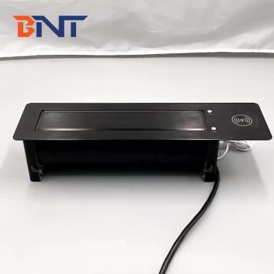 China Built in wireless charger motorized rotate table socket with EU power plug for sale