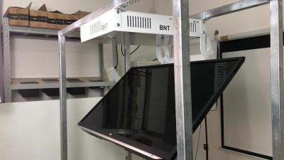 Motorized TV ceiling lift mounted for hidden