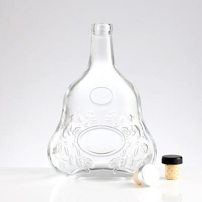 China Garrafa de vidro de licor de vinho e uísque com tampa de cortiça transparente redonda vazia e tamanho personalizado à venda
