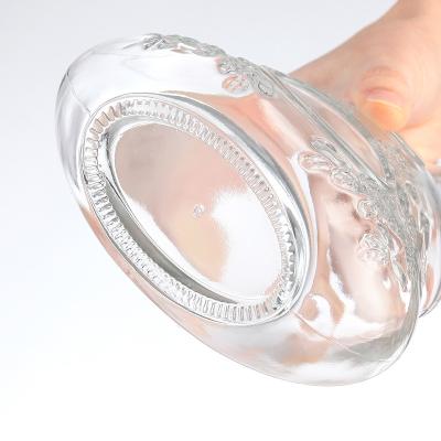 China Garrafa de vidro de licor de vinho e uísque com tampa de cortiça transparente redonda vazia e tamanho personalizado à venda