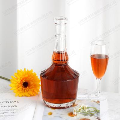 China Garrafas de vinho de vidro Transparente Personalizar 200ml 300ml Forma única com tampa de vidro à venda
