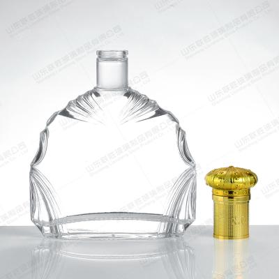 Cina Acid Etch Surface Handling Glass Whisky Brandy Bottle con tappo a cristallo rotondo in vendita