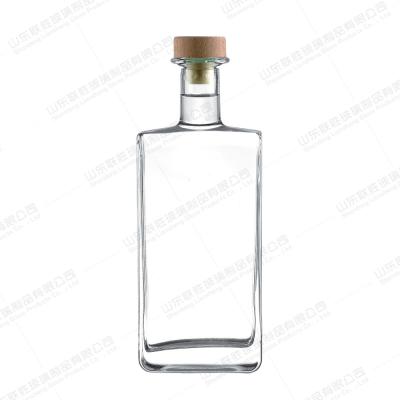 China Collar de vidro 250ml 500ml 750ml garrafa de uísque plana com tampa de parafuso e cor personalizada à venda