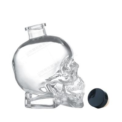 China Garrafa em forma de caveira de vidro saudável sem chumbo para Whisky Vodka Spirits 500ml 750ml 1000ml à venda