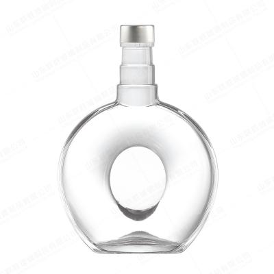 Cina Colore personalizzato 500ml 700ml 750ml Bottiglia di vetro piatta rotonda per imballaggi di bevande in vendita