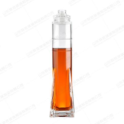 Cina 700 ml bottiglia di vetro con tipo di chiusura del coperchio di vetro e superficie deccale per gin e tequila in vendita