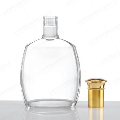 Cina Bottiglia di tequila in vetro trasparente con coperchio dorato in vendita