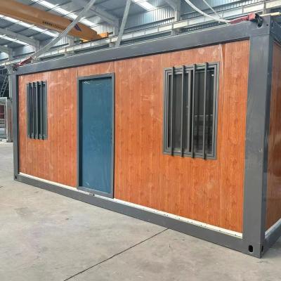 China Eco Friendly Z Folding Container House Detachable With Orange EPS Sandwich Wall Panel for sale