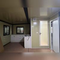 China 20ft Expandable Container House with Stone-Texture Cladding and Dark Grey Frame for sale