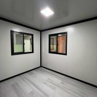China 20ft Expandable Container House with Grey Cladding, Black Frame and Fitted Interior for sale