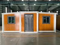 China 20ft Expandable Container House with Wood-Grain Cladding and Dark Grey Window Frames for sale