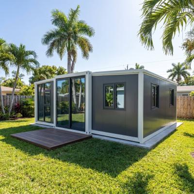 China 20ft Expandable Container House with Grey Cladding, White Frame and Glass Sliding Doors for sale