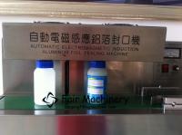 China 380V PLC Screw Capping Machine Automatic Induction Sealing 50B/Min for sale