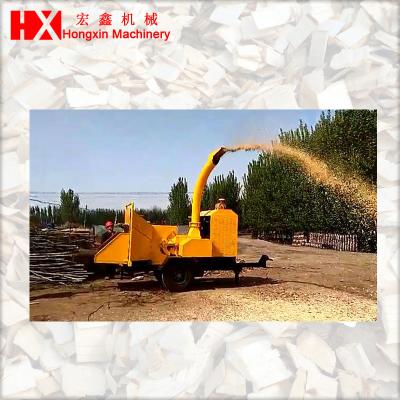 China tree branch grinder with diesel engine and wheels for converting branches and wood logs into valuable wood chips for sale