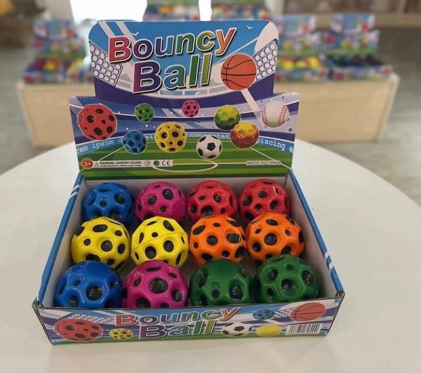 Quality Kids' Favorite High Resilience Moon Shape Porous Bouncy Ball with Ergonomic for sale