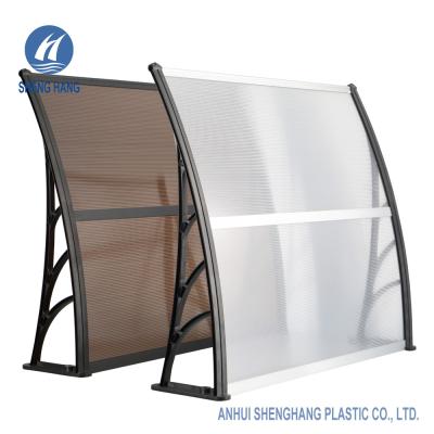 Cina I baldacchini di plastica della porta delle chiare del policarbonato tende della finestra espongono al sole la protezione della neve in vendita