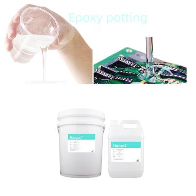 China Clear Epoxy Potting Compound with 2:1 Mix Ratio and 70 Shore D Hardness for Solar Inverter Encapsulation for sale