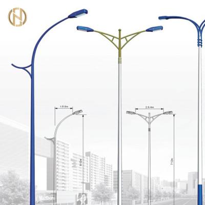 China 3-12M Octagonal Shape Road Lamp Post Q345B Double Arm High Durability for sale