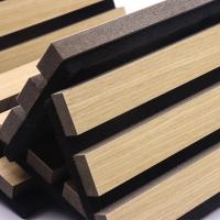 China MDF Wood Slat Acoustic Panel 27mm Strip Width 13mm Gap Sound Absorbing Wall Ceiling Panel for sale