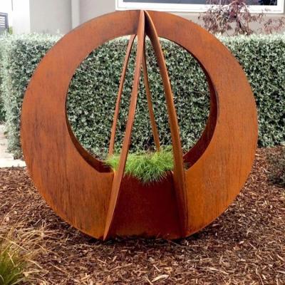 Cina Grandi piantatrici decorative del fiore della palla della lama del metallo di Corten per il paesaggio del giardino in vendita