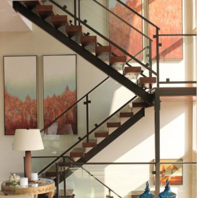 China Indoor metal stringer stair with wood treads and glass balustrade for sale
