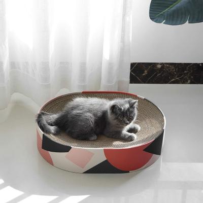 Cina Bordo ondulato ovale Cat Scratching Board interattiva di Cat Scratching Cardboard Durable Recycle in vendita