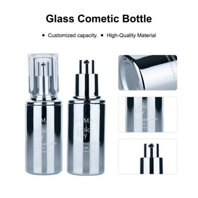 Cina Bottiglia cilindrica in vetro argento con guarnizione trasparente per bottiglie di vetro cosmetiche da 50 ml in vendita
