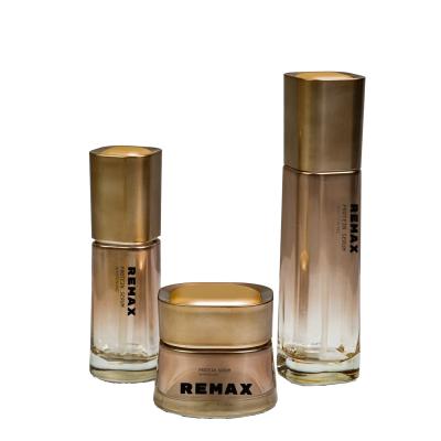 China 50g 40ml 100ml Goldplattierte Deckel Gradient Quadrat Glasmaterial Lotion Flasche Creme Jar Hautpflege Set Verpackung zu verkaufen